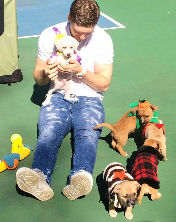 Caps Hold Photoshoot For New Dog Calendar, Alex Ovechkin Holds Adorable ...