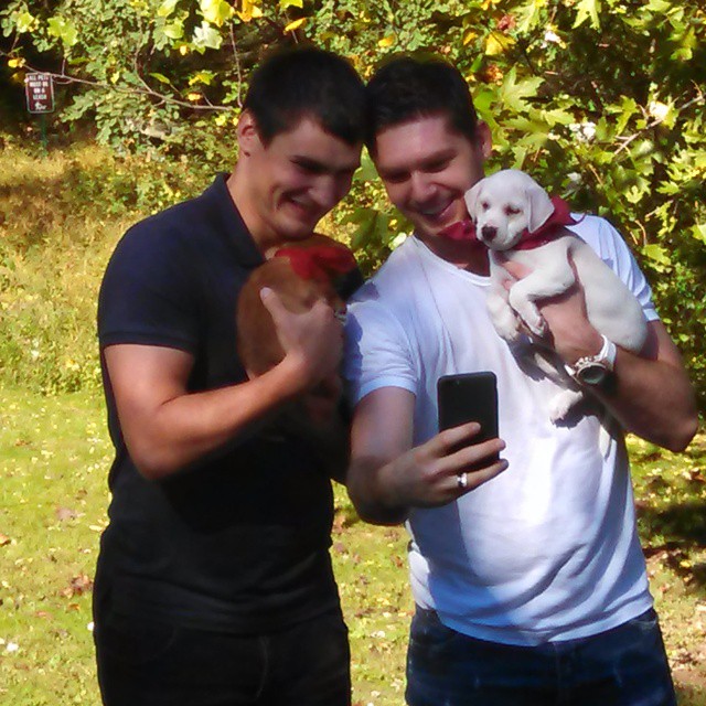 Caps Hold Photoshoot For New Dog Calendar, Alex Ovechkin Holds Adorable ...