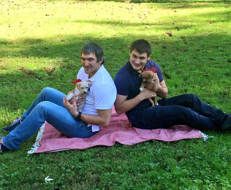 Caps Hold Photoshoot For New Dog Calendar, Alex Ovechkin Holds Adorable ...