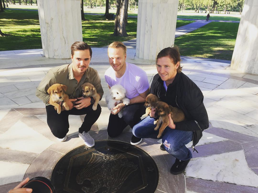 Alex Ovechkin, Evgeny Kuznetsov, and Braden Holtby take photos with ...