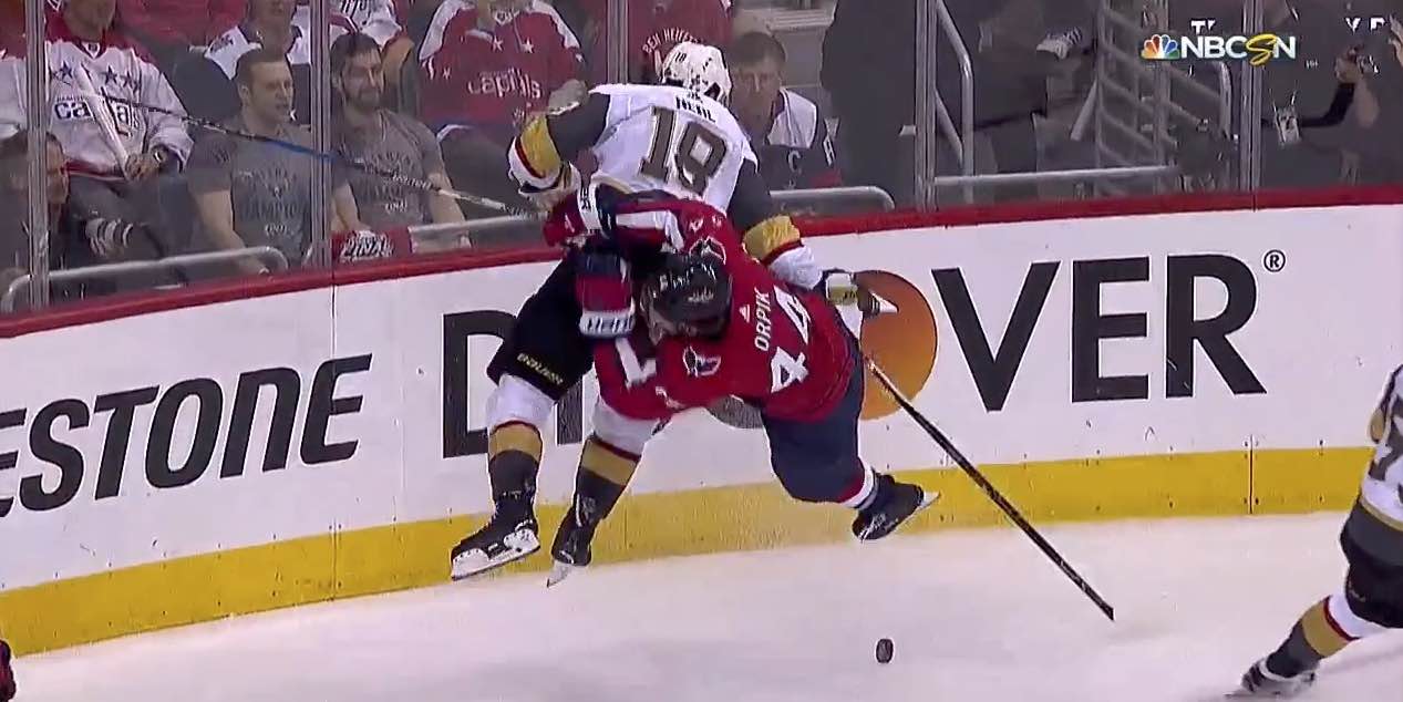 Brooks Orpik leaves game after hit from James Neal
