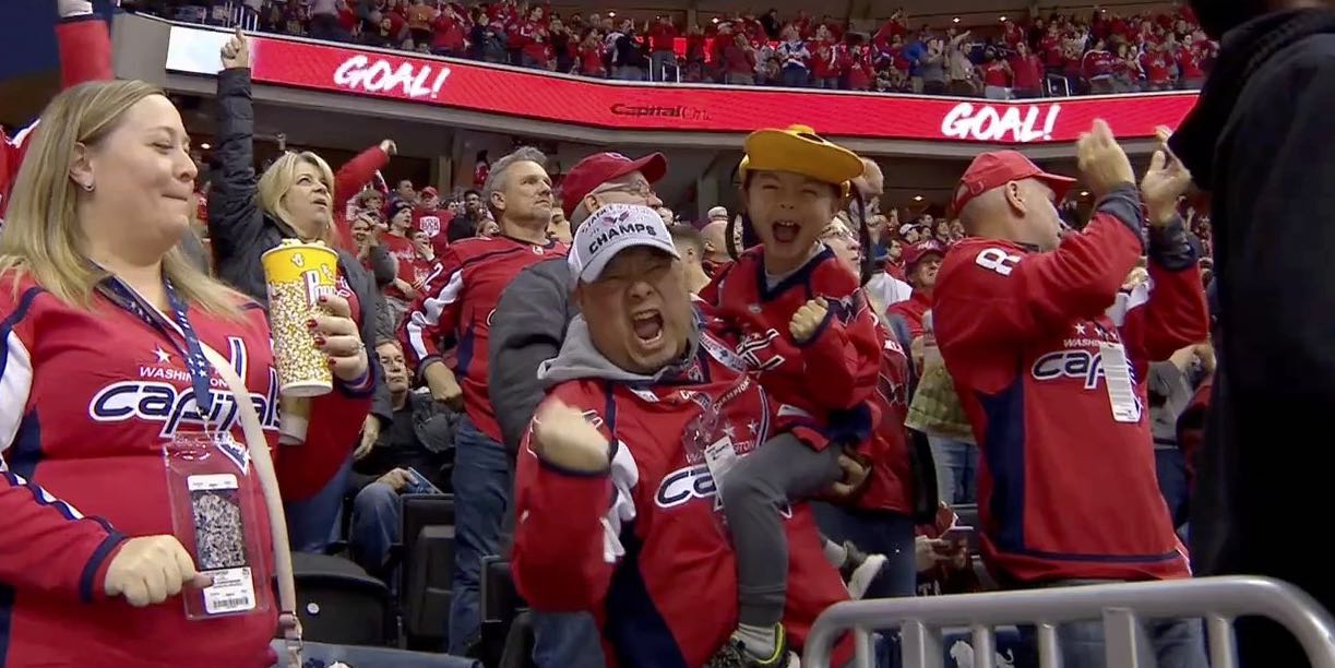 caps-fans-celebrating-happy