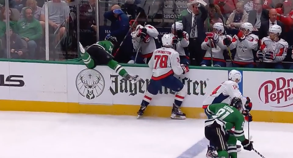 Tyler Lewington nearly checks Jamie Benn into Capitals bench