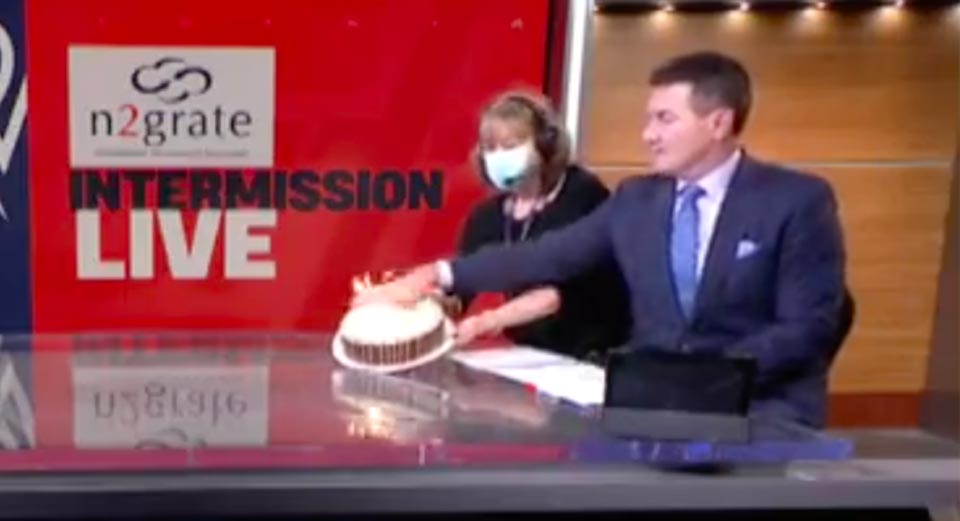 Alan May tried to extinguish the candles on his birthday cake using his ...