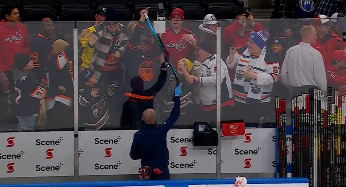 Capitals fan in Edmonton cries in excitement after getting what appears ...