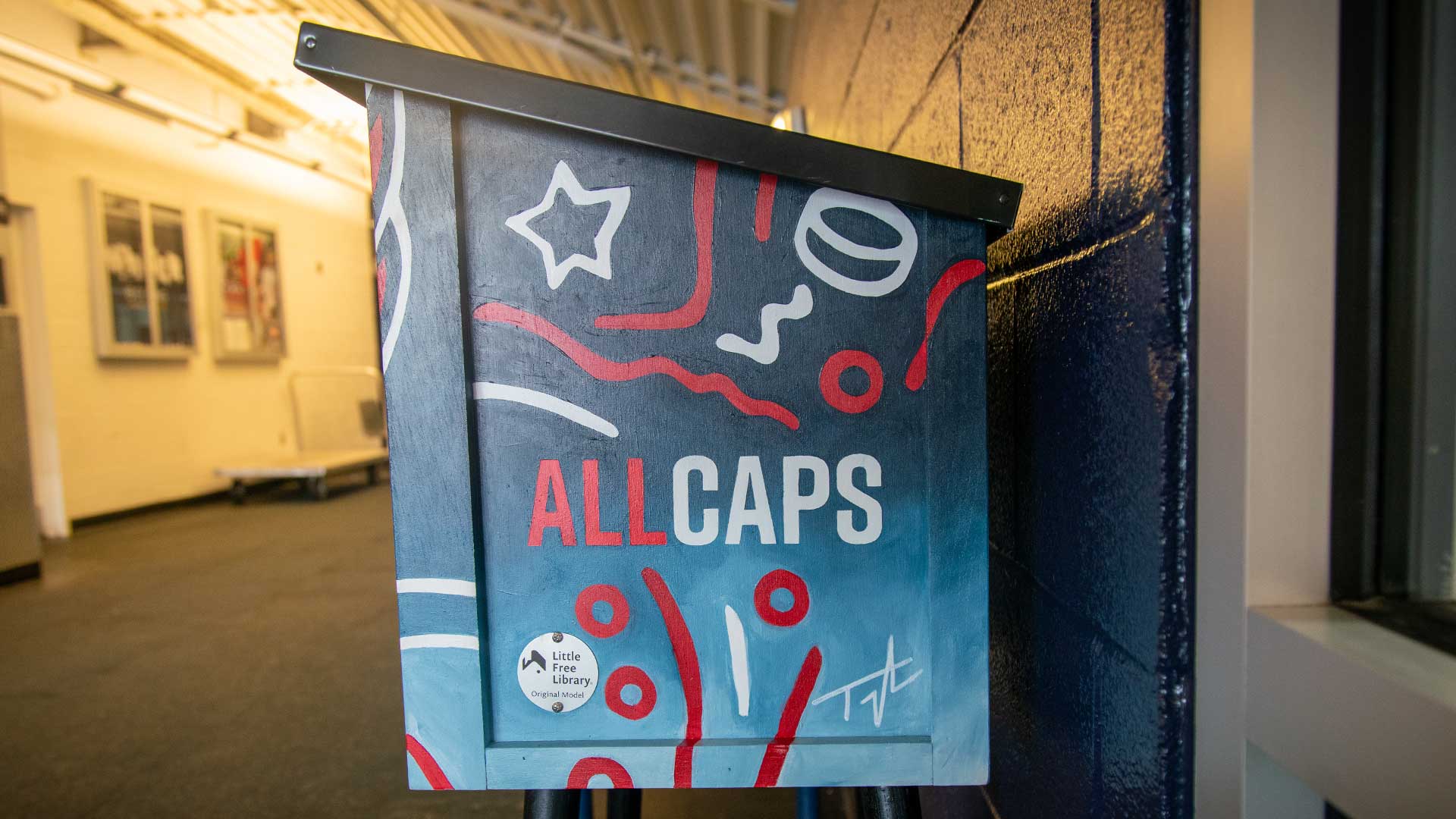 Caps players choose their favorite books for a Little Free Library book ...