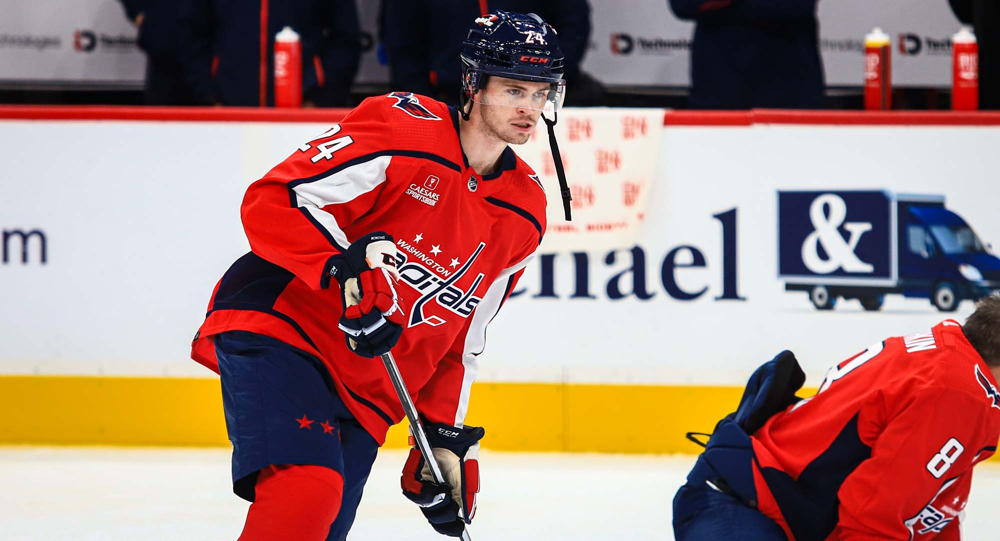 Connor McMichael splits practice reps with Nicklas Backstrom at center ...