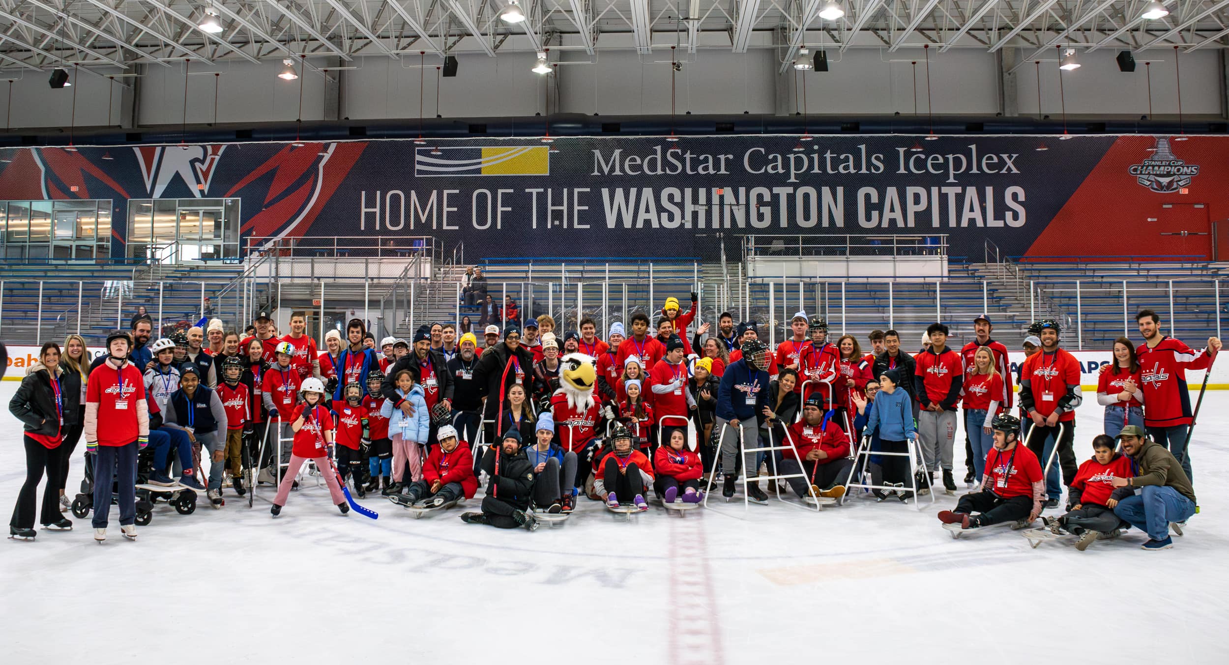 Charlie Lindgren and Nic Dowd help host adaptive skate for children ...